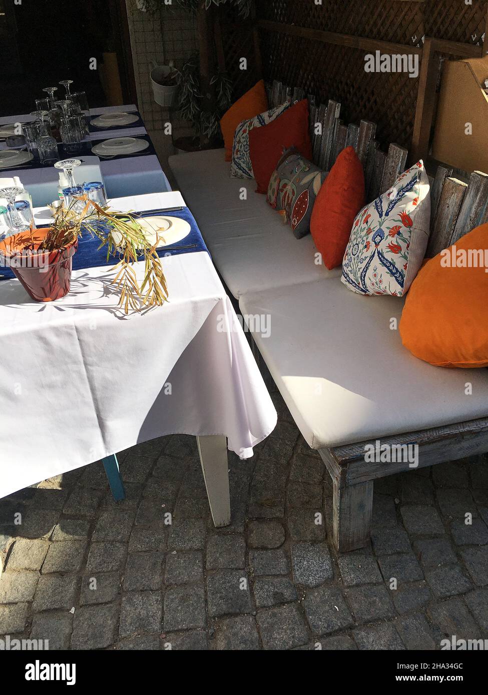 Retro style cafe in the street with cobblestones Stock Photo - Alamy