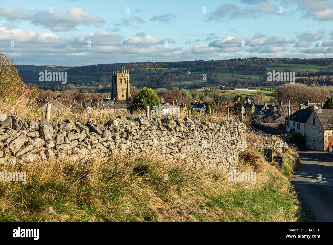 View of Youlgrave from Moor Lane looking towards All Saints Church and ...