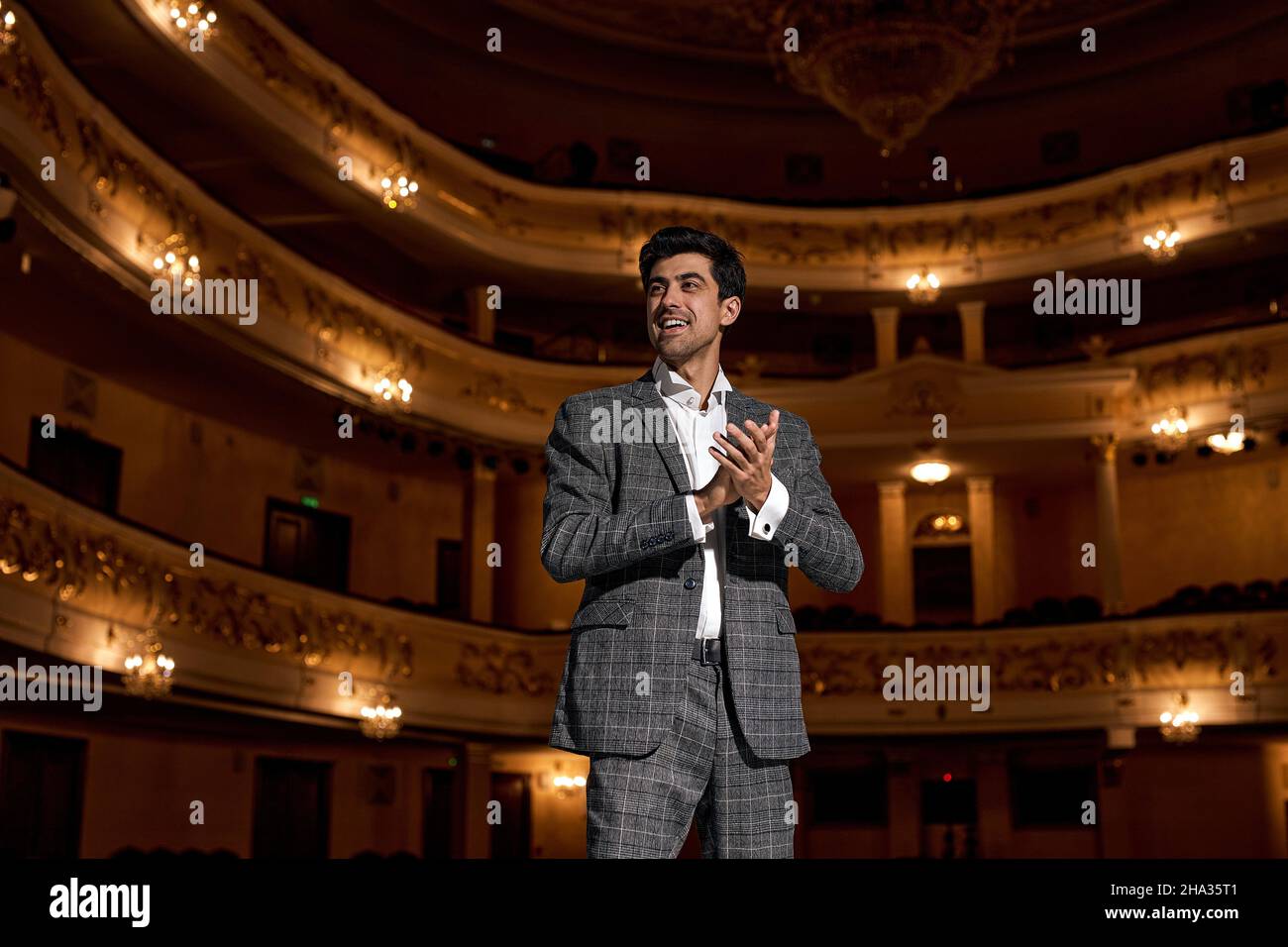 Young male entertainer, presenter or actor on stage. male public ...