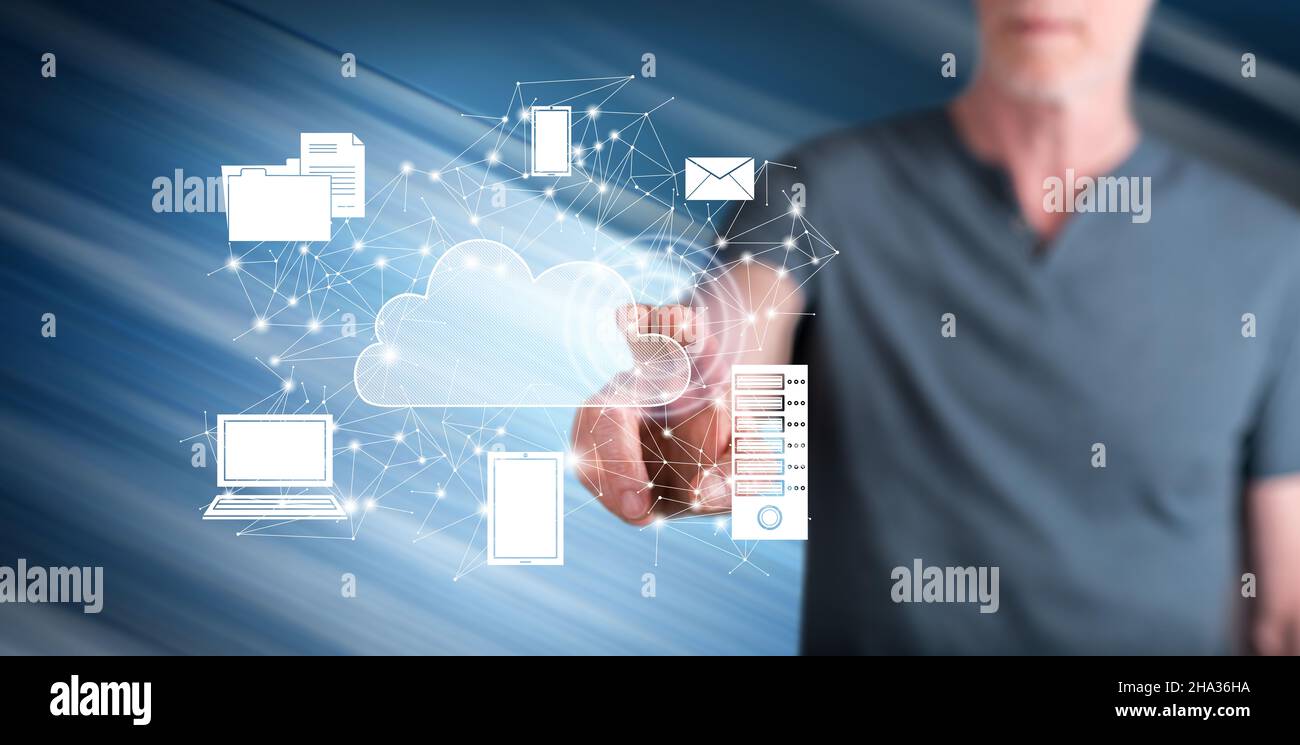Man touching a cloud computing concept on a touch screen with his ...