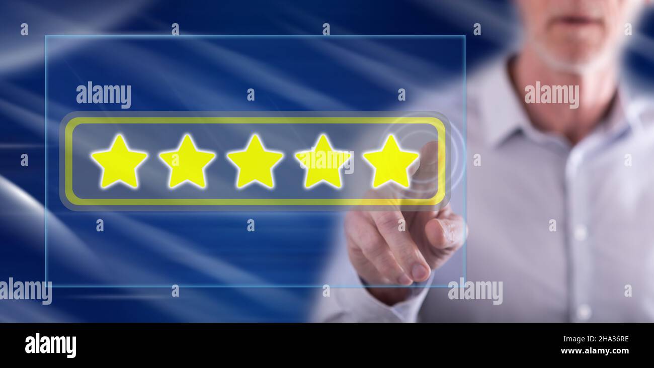 Man touching a quality concept on a touch screen with his finger Stock ...