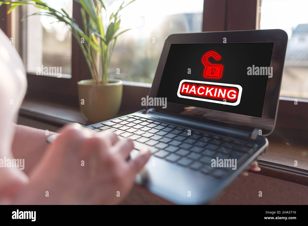 Laptop screen displaying a hacking concept Stock Photo - Alamy