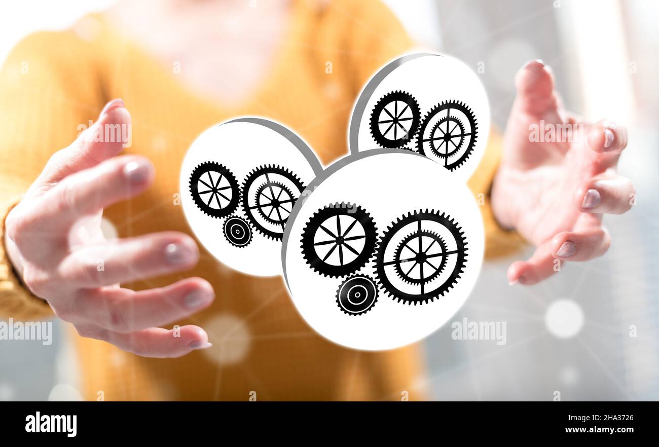 Teamwork concept between hands of a woman in background Stock Photo - Alamy