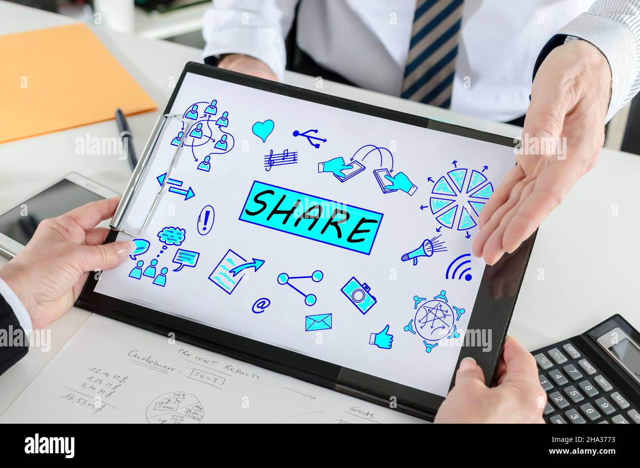 Share concept shown by a businessman Stock Photo - Alamy