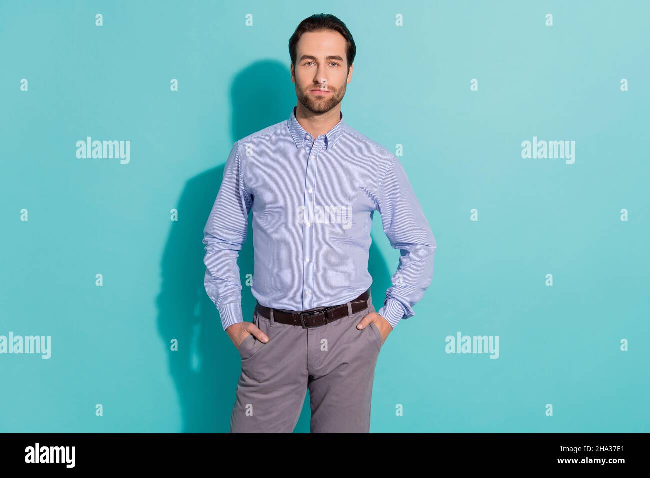 Photo of charismatic executive ceo company guy hands pockets posing ...