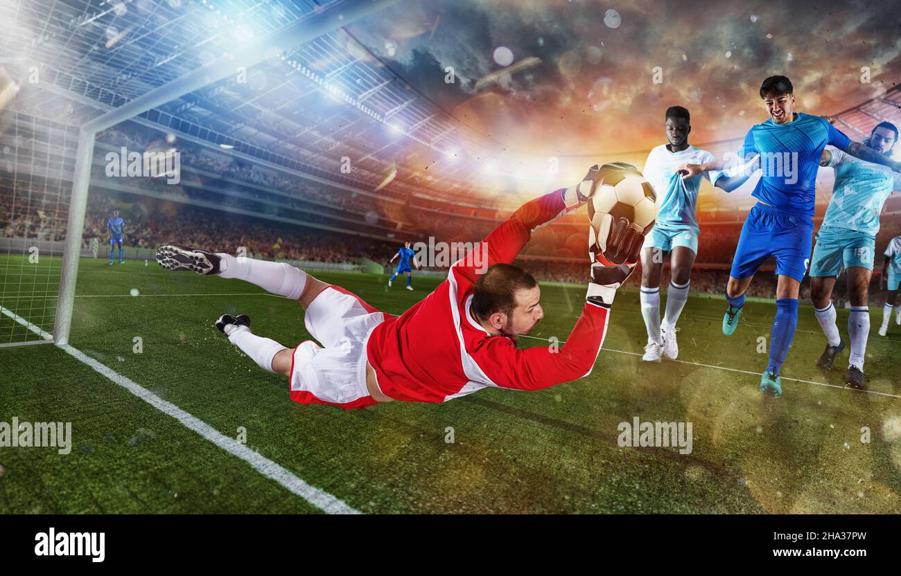 Football scene with soccer players and goalkeeper at the stadium Stock ...