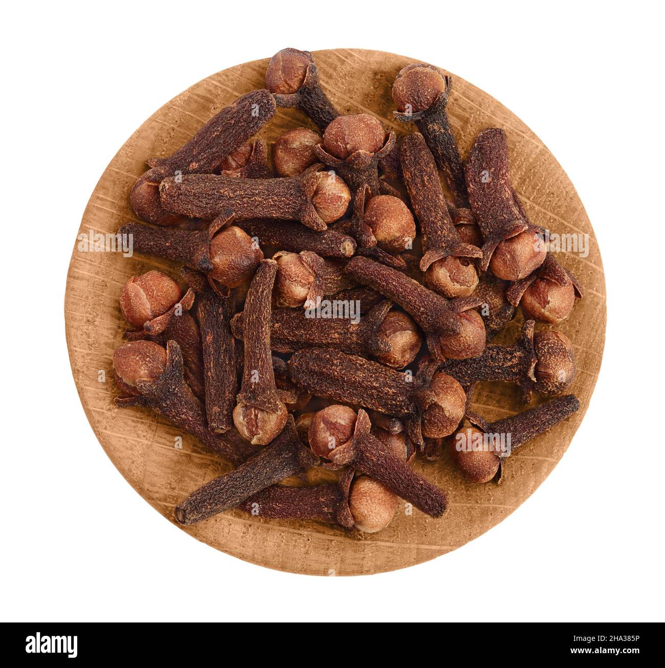 Dry spice cloves in wooden bowl isolated on white background with ...