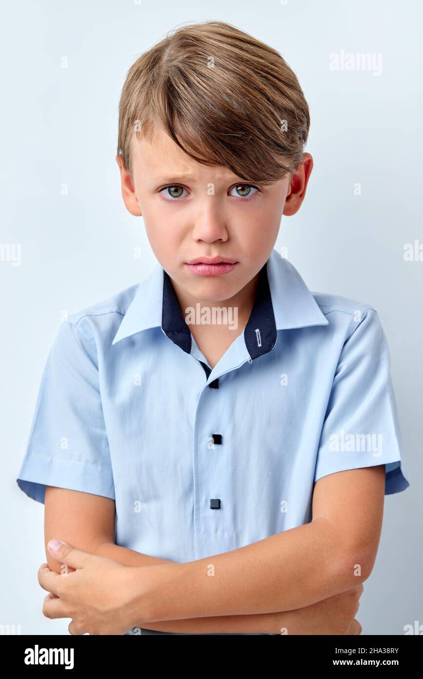Cute Offended Caucasian Little Boy Posing Isolated On White Background ...