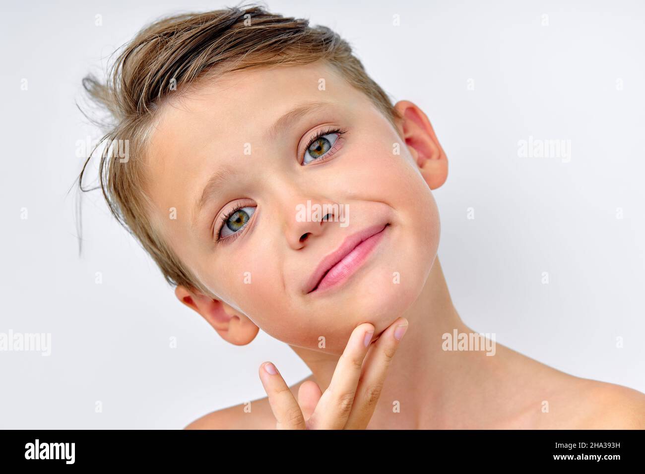 Happy, smiley little caucasian boy isolated on white studio background ...