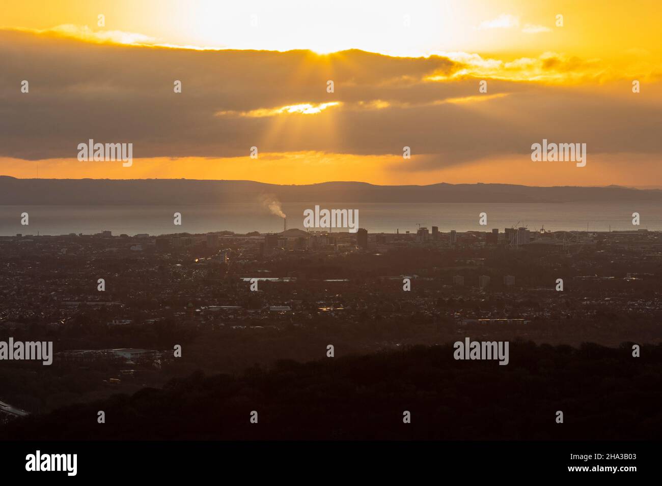 The sun begins to rise above the city of Cardiff, Wales, UK, December ...