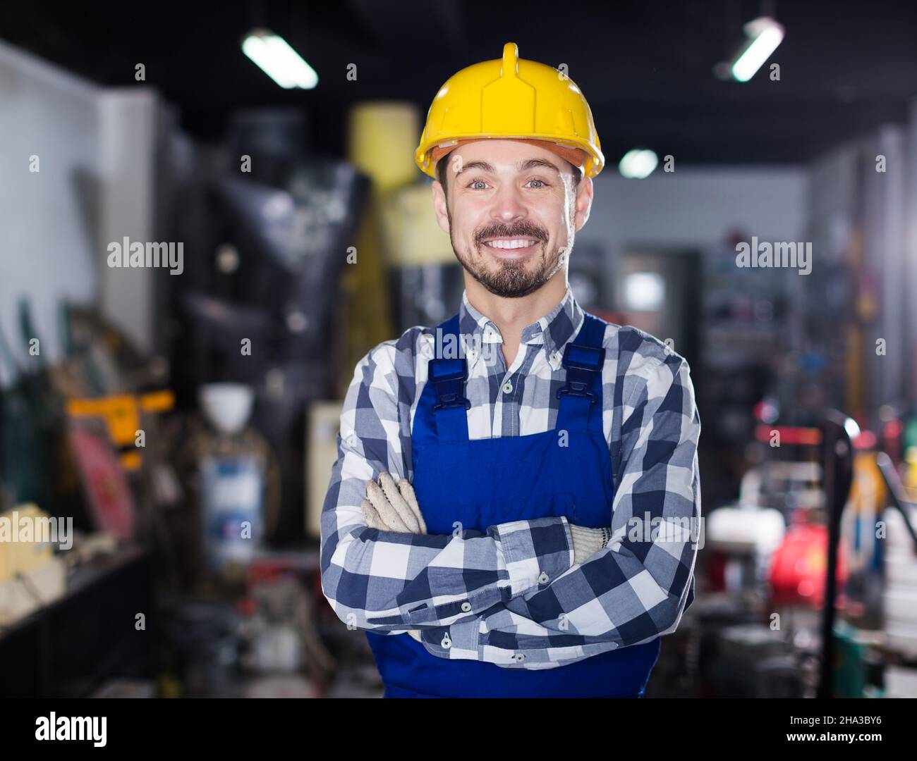 Male worker showing his workplace Stock Photo - Alamy