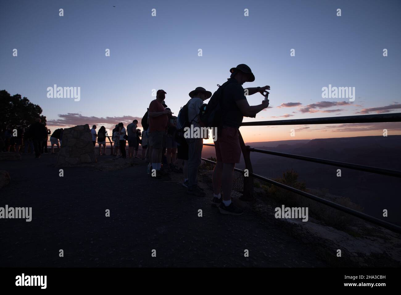 Grand Canyon, Arizona, Hopi Point victors watch the sunset Stock Photo ...