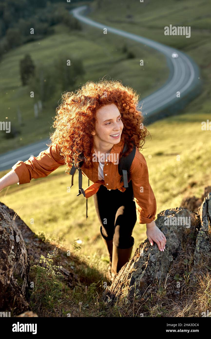 Portrait Of Enthusiastic Active Redhead Lady Hiking Travelling Alone In ...