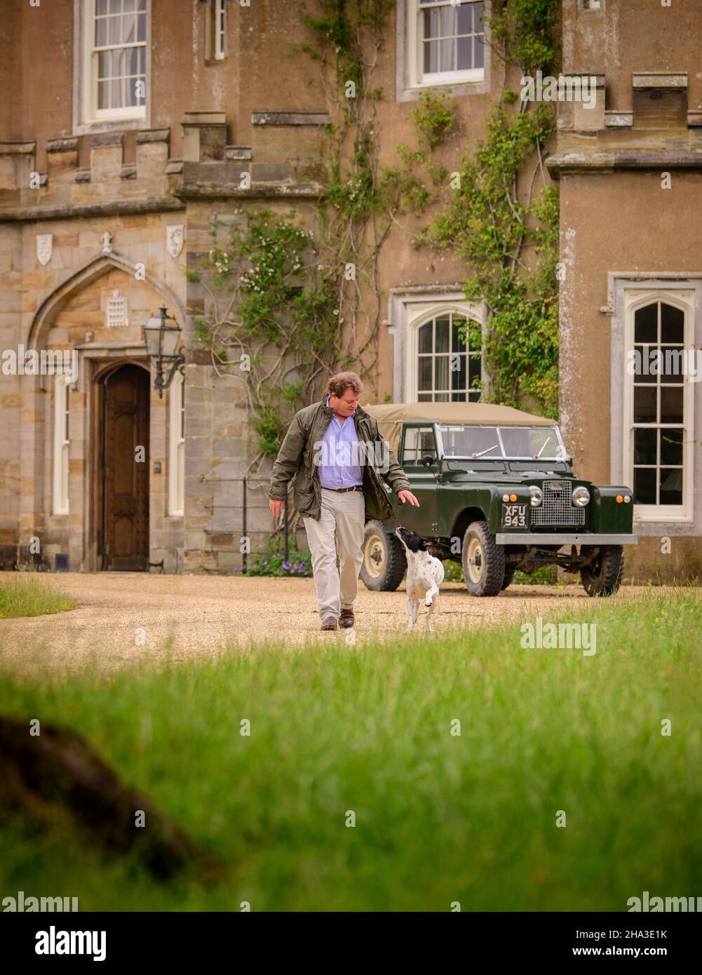 Knepp, UK. 17 June, 2021. Charlie Burrell and Milo his dog at their ...