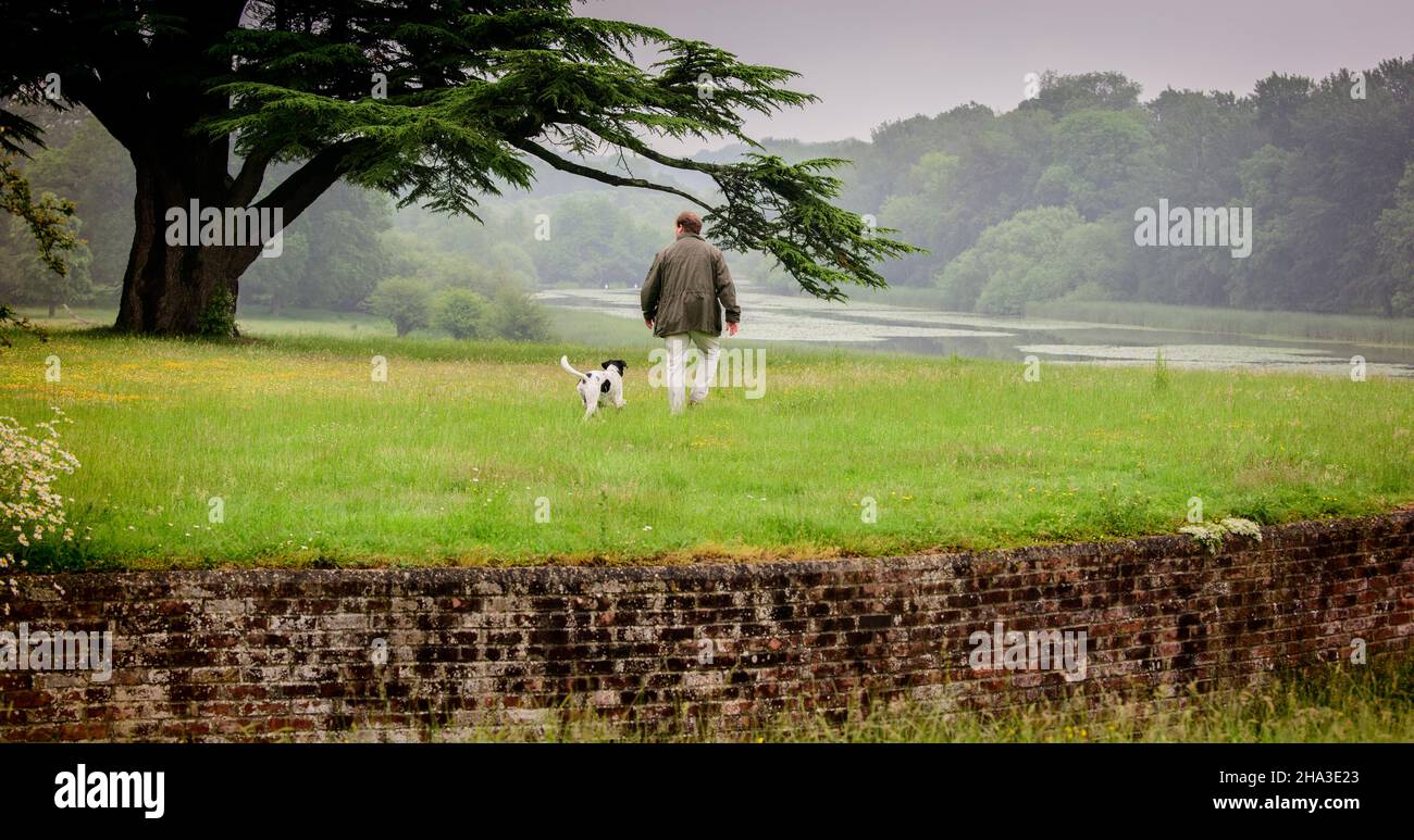 Knepp, UK. 17 June, 2021. Charlie Burrell and Milo his dog at their ...