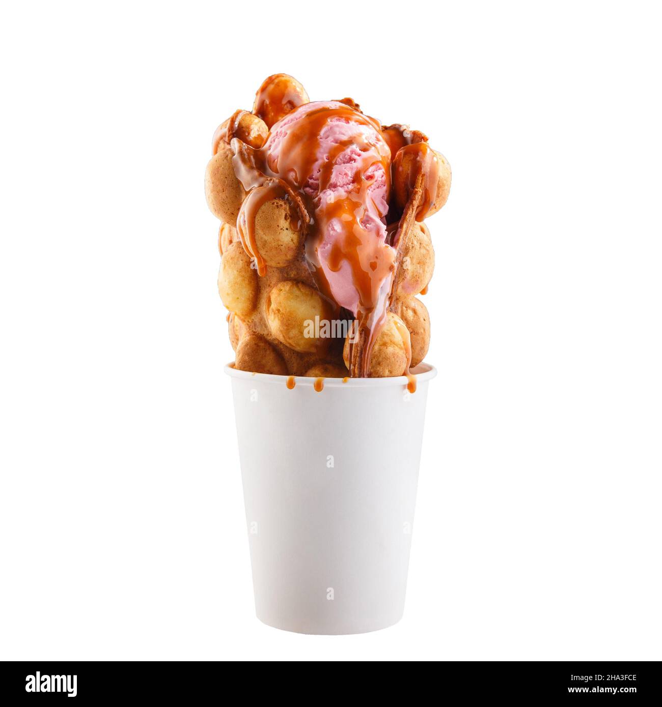Hong Kong waffles with strawberry ice cream in paper cup isolated on ...