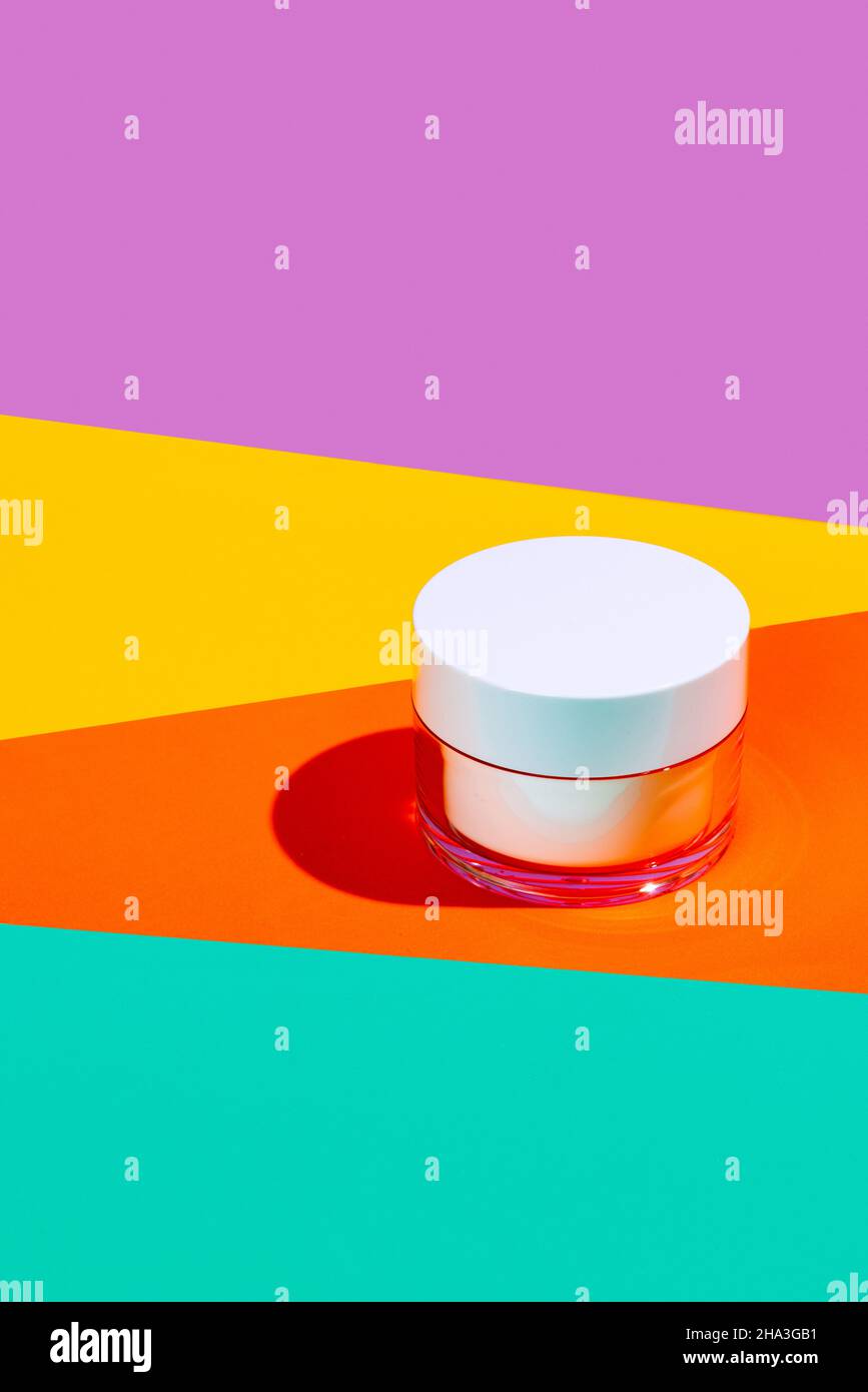 Closed glass cream pot with copy space for your brand isolated on ...