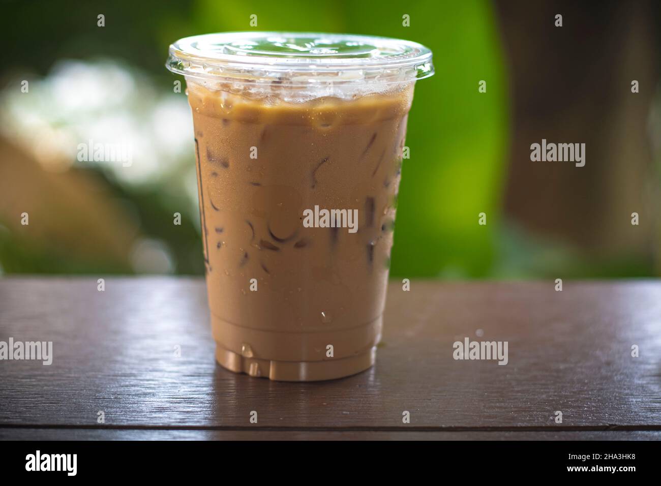 iced latte coffee in a tall glass. cold summer drink background Stock ...