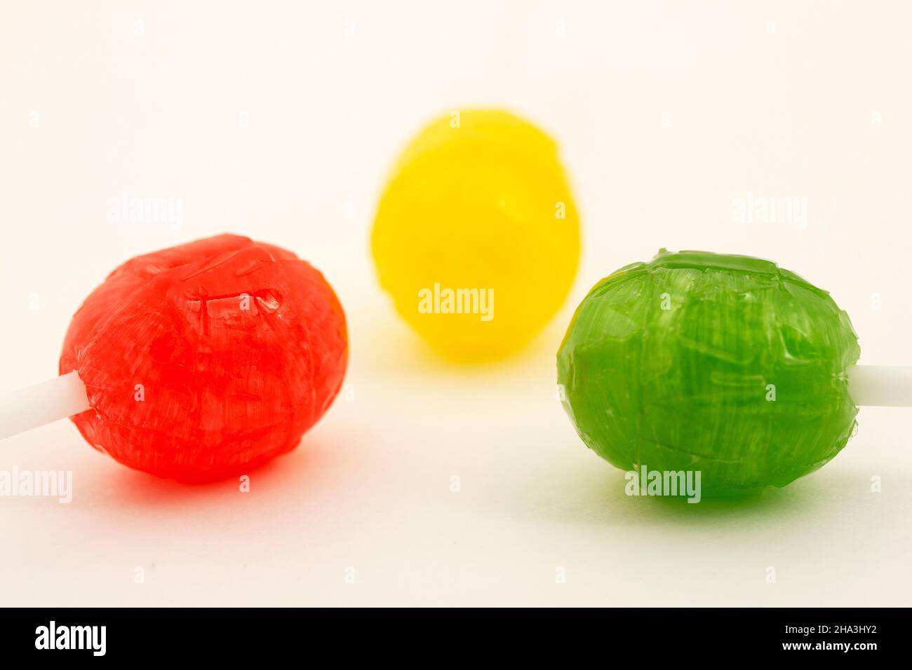 Three delicious lollipops isolated on white Stock Photo - Alamy