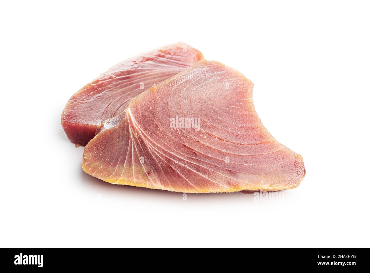 Raw tuna steak. Raw fish meat isolated on white background Stock Photo ...
