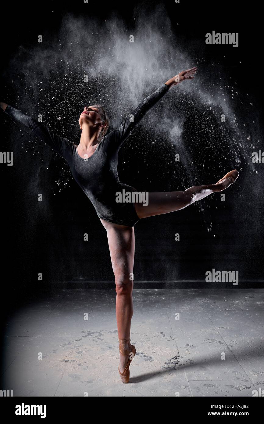 beautiful slender ballet dancer woman wearing bodysuit, posing dancing ...