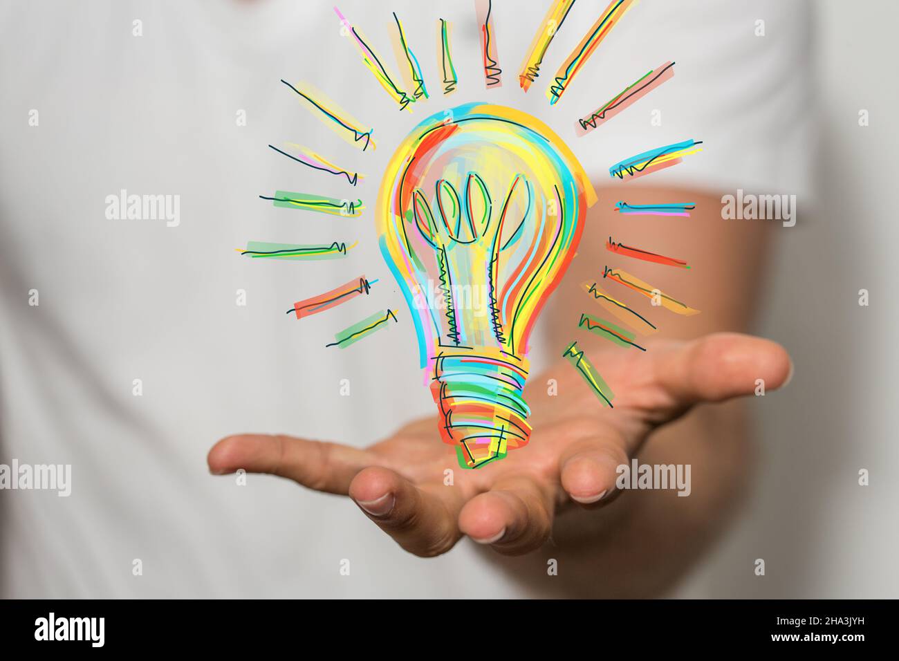 3D rendered lightened lamp in a male hand Stock Photo - Alamy