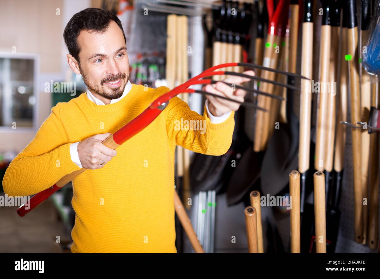 Customer examining hi-res stock photography and images - Alamy