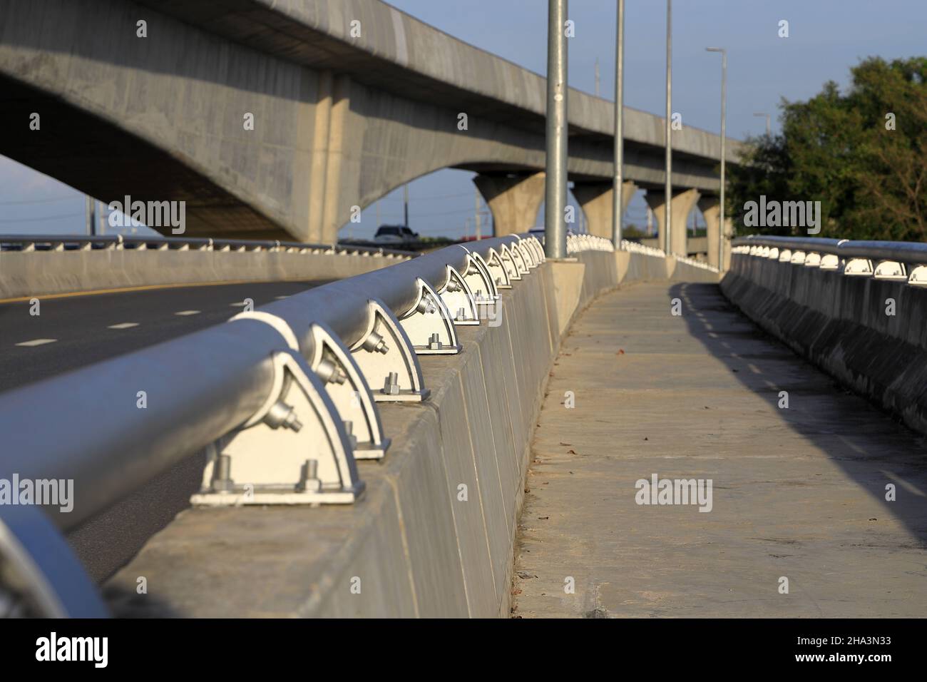 Close up and detail of metal railings on new pedestrian bridge beside ...