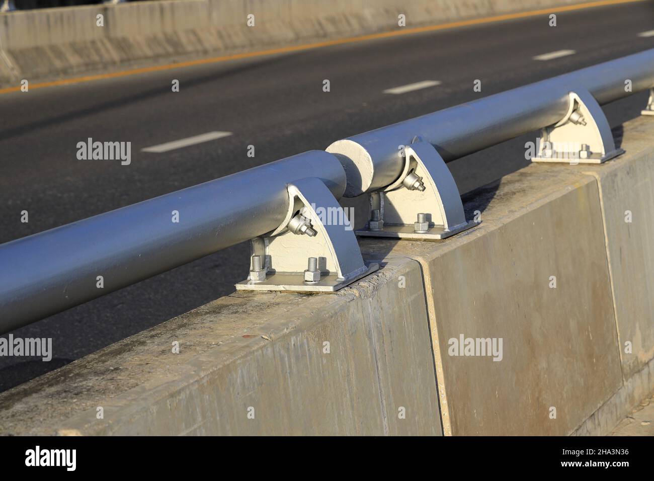 Close up and detail of metal railings on new pedestrian bridge beside ...