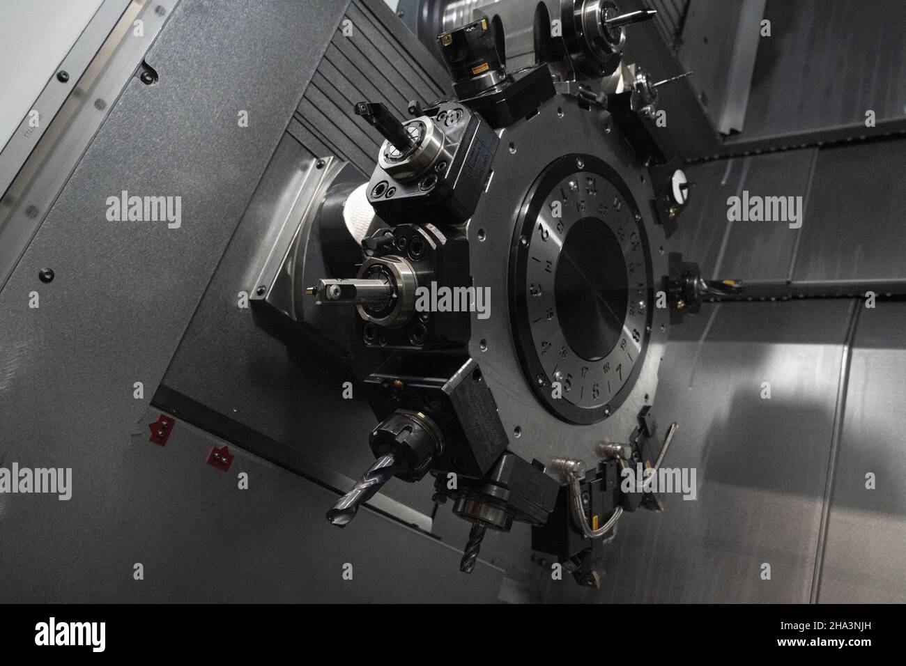 motorized turrets in a CNC lathe Stock Photo - Alamy