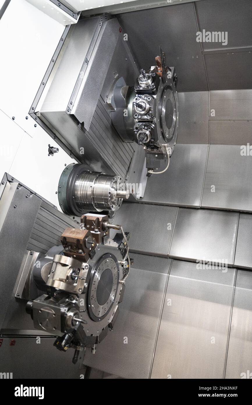 motorized turrets in a CNC lathe Stock Photo - Alamy