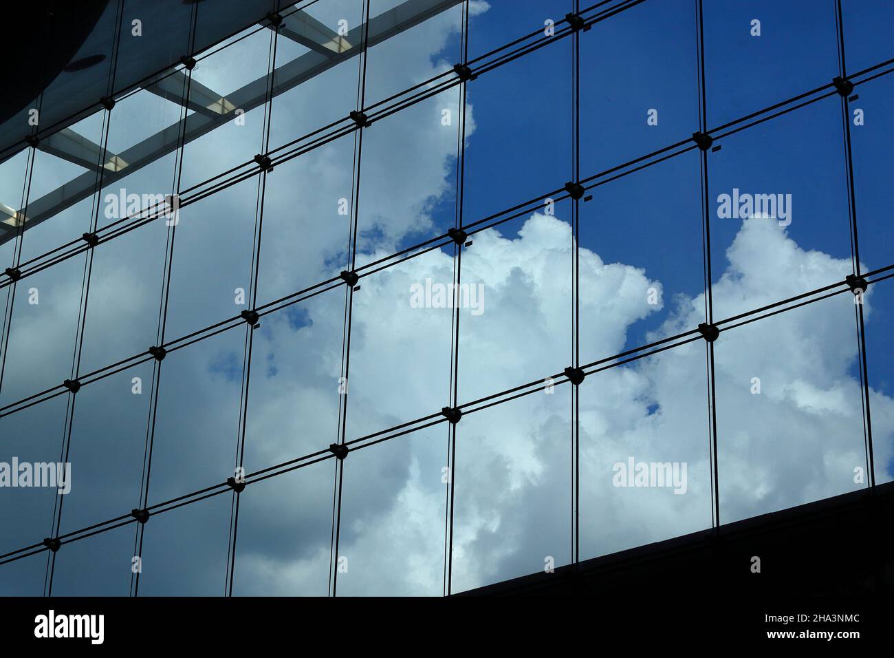 Glass wall in the office building, modern glass building, skyscrapers ...