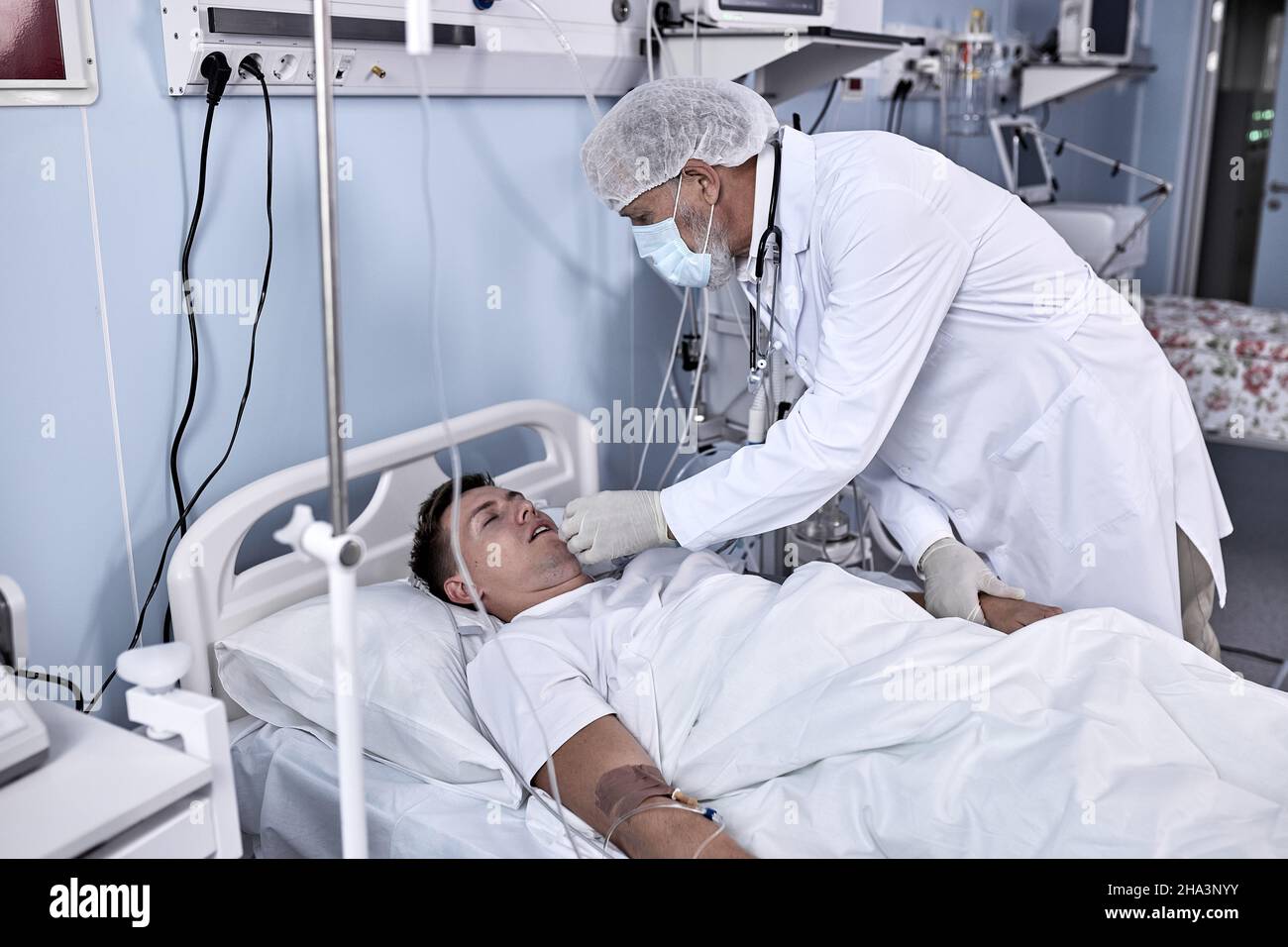 injured man lying in bed hospital room in bad health condition after ...