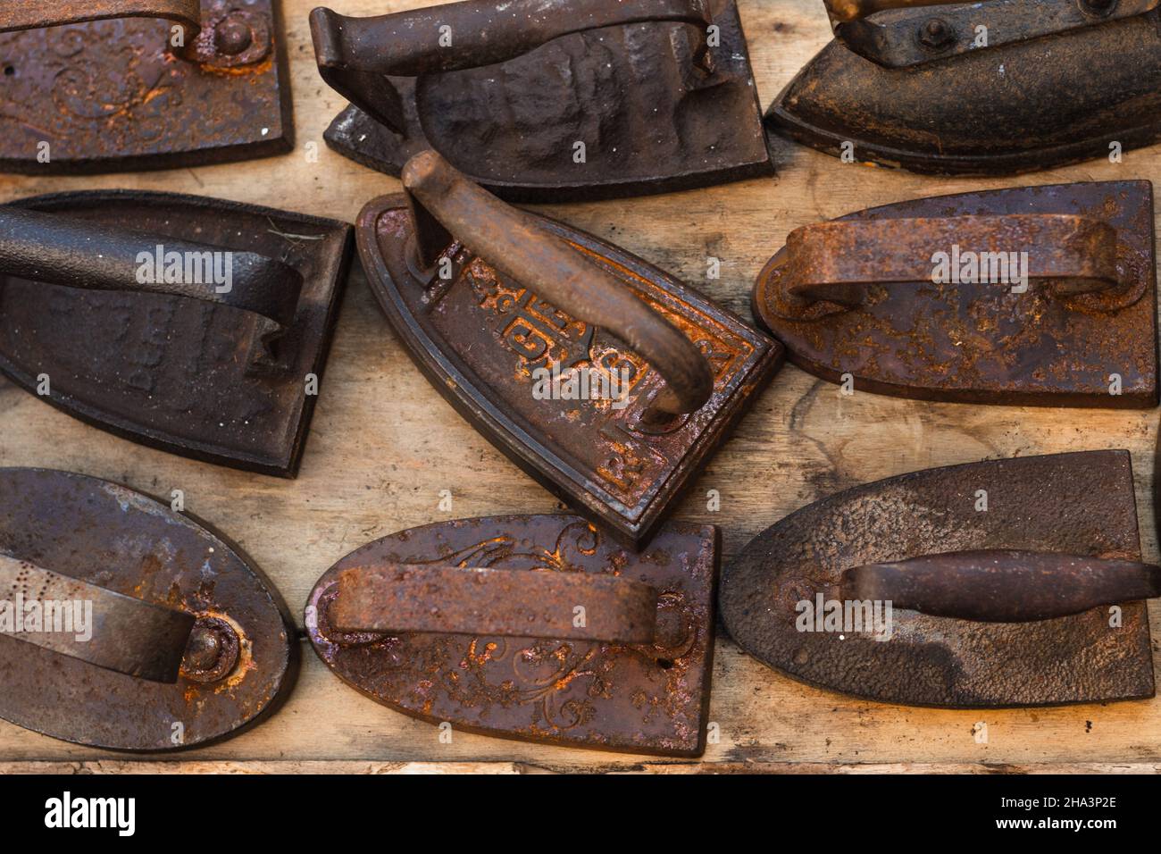 Set of rusty cast iron on a flea market Stock Photo - Alamy