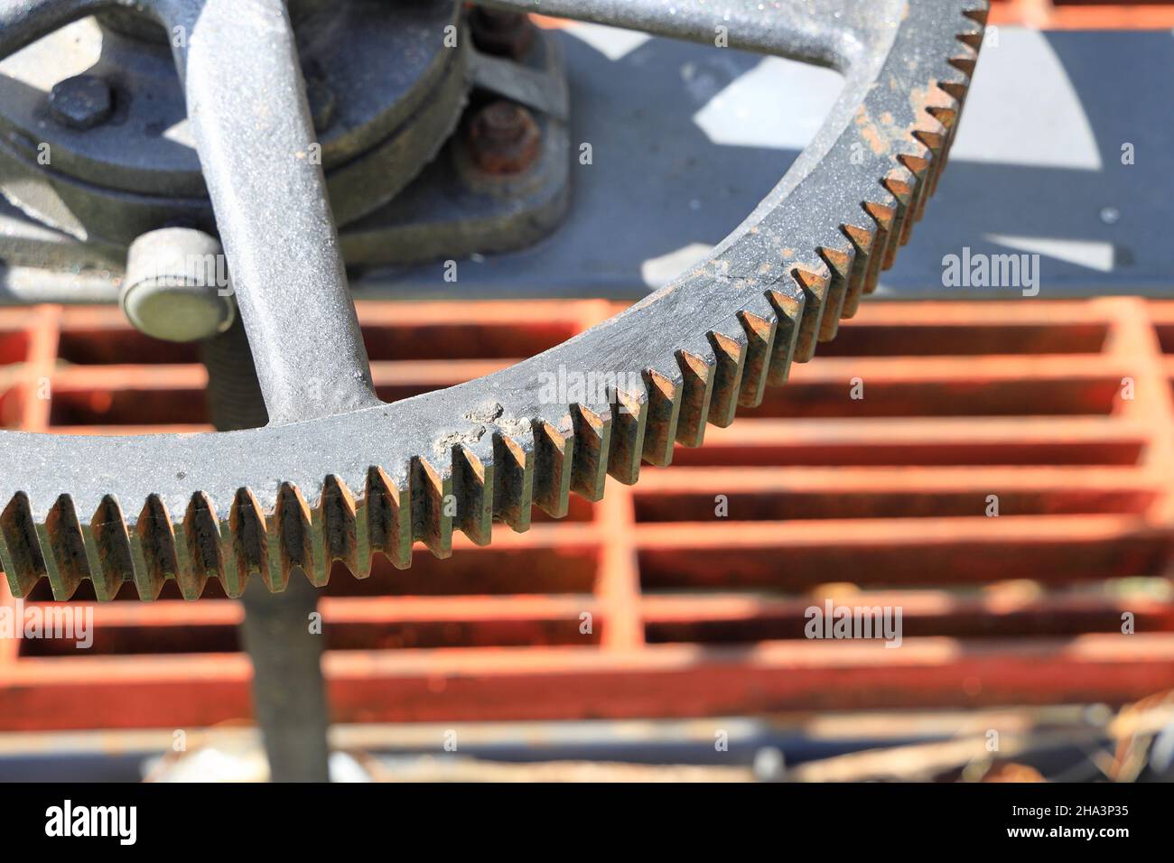 Large cog wheels with control wheel, part of cog mechanical close-up ...