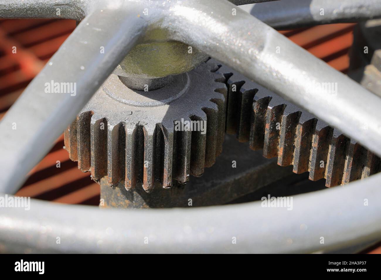 Large cog wheels with control wheel, part of cog mechanical close-up ...