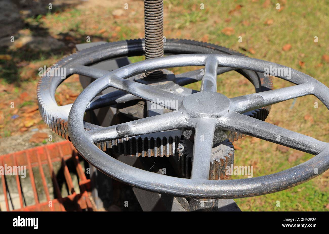Large cog wheels with control wheel, part of cog mechanical close-up ...