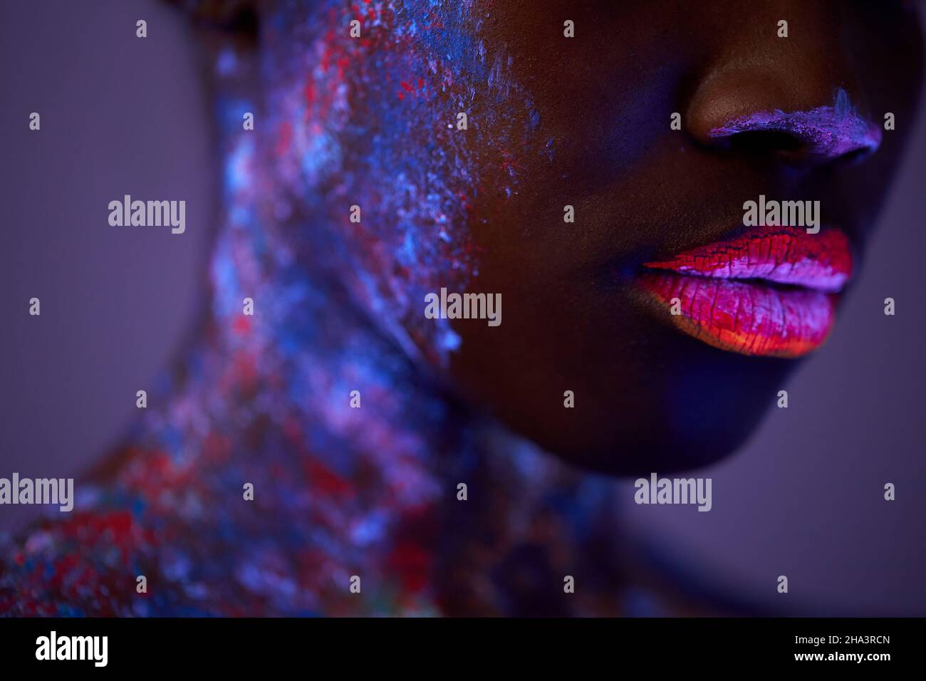 Close-up Portrait Of Female Lips, With Dark SKin In Fluorescent Body ...