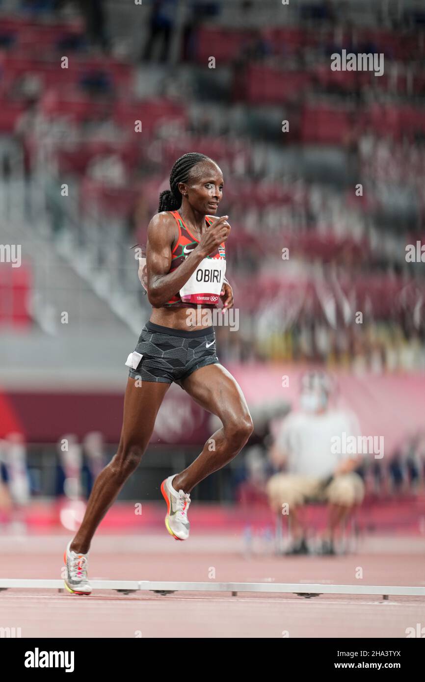Hellen Obiri competing in the 10,000 meters of the 2020 Tokyo Olympics ...