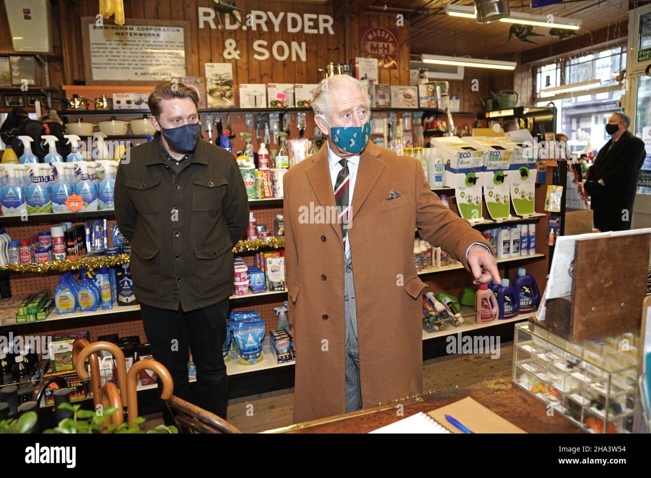 The Prince of Wales (right) during a visit to Hafod Hardware store in ...