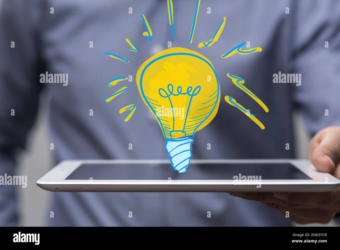 3D rendering of a light bulb icon floating on a tablet - new idea ...