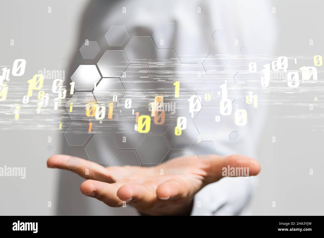3D rendering of binary codes icons floating businessman's hand - digital communication concept ...