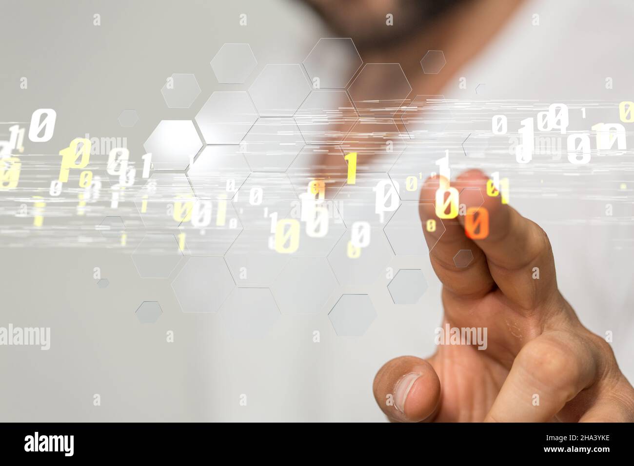 3D rendering of a businessman pointing on binary codes icons - digital communication concept ...