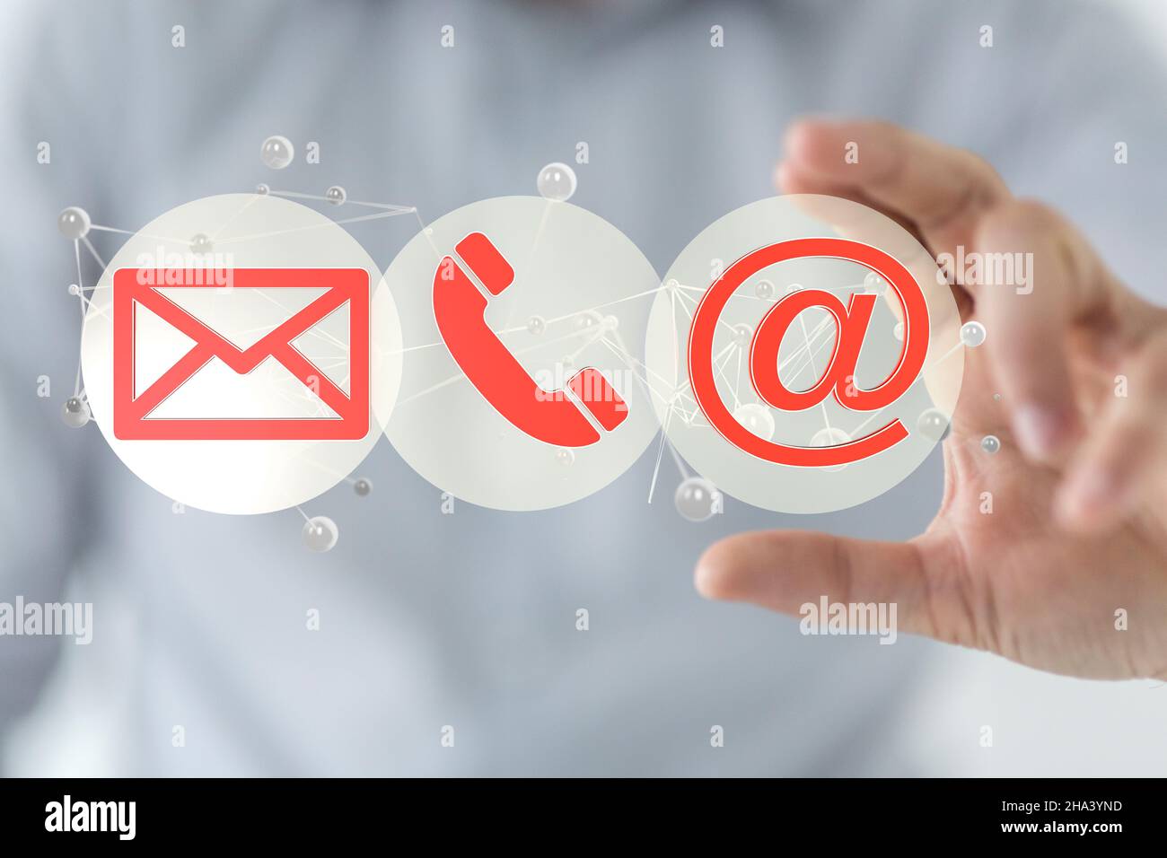 3D rendering of a businessman pointing at floating email icons ...