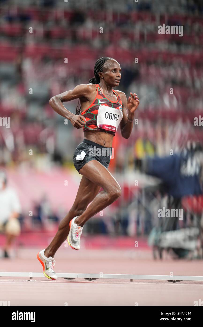 Hellen Obiri competing in the 10,000 meters of the 2020 Tokyo Olympics ...