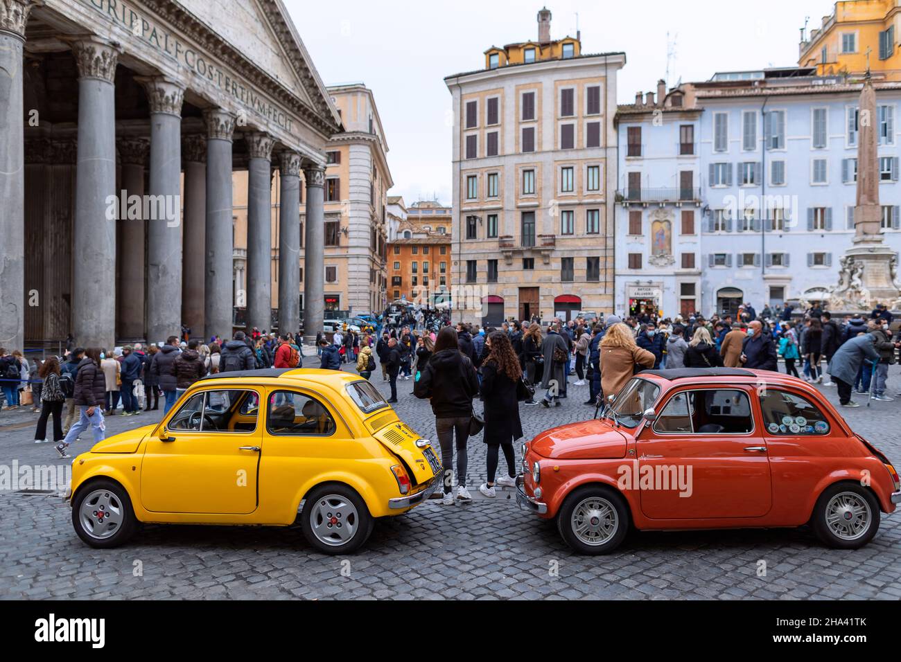 Rome, Italy - November 28, 2021: Two red and yellow Fiat 500 cars ...
