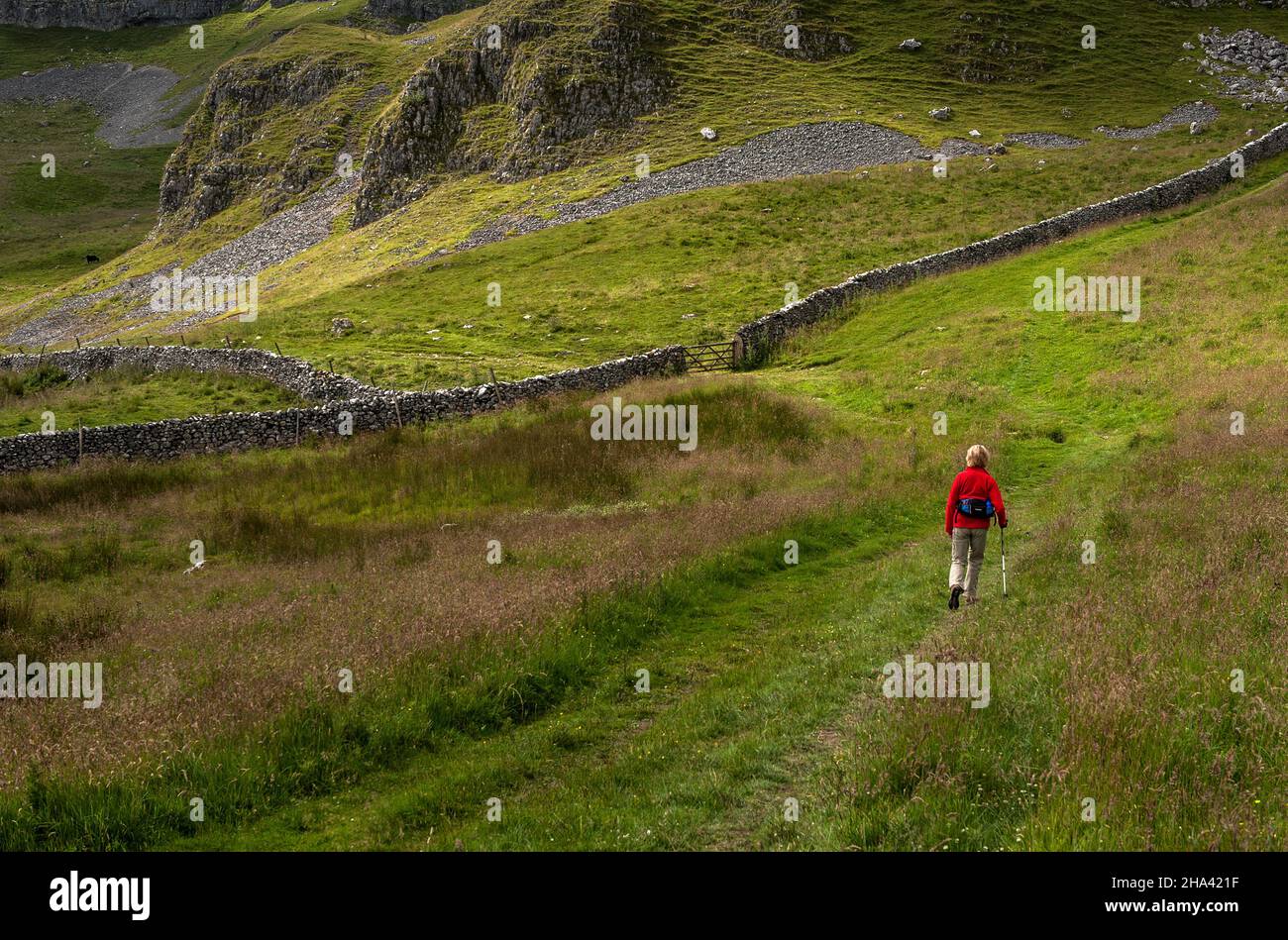 Walking towards Attermire Scar above Settle in The Yorkshire dales ...