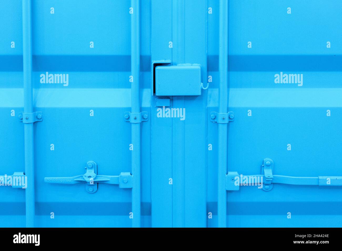 A colourful bright blue steel storage or shipping container Stock Photo ...