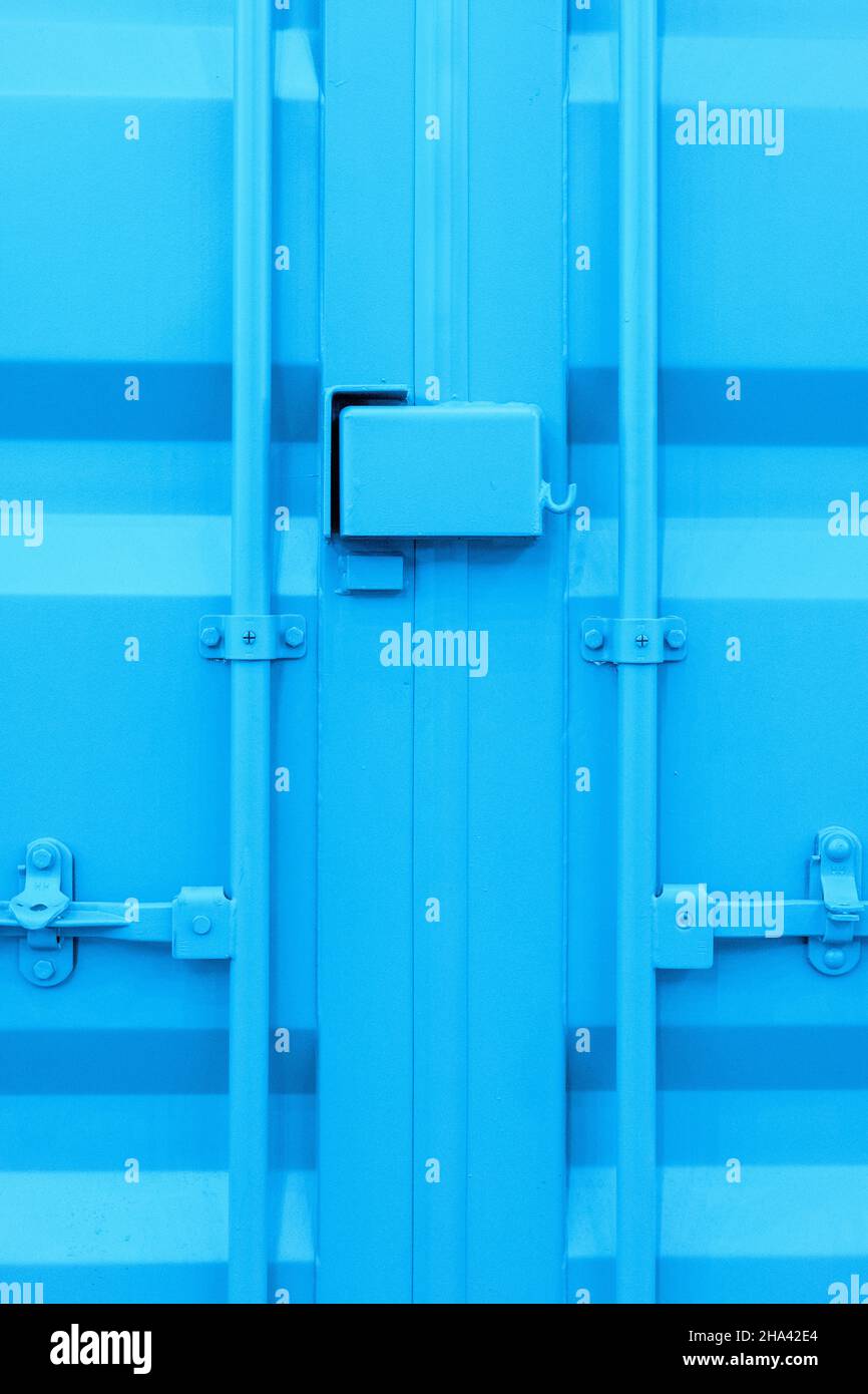 A colourful bright blue steel storage or shipping container Stock Photo ...