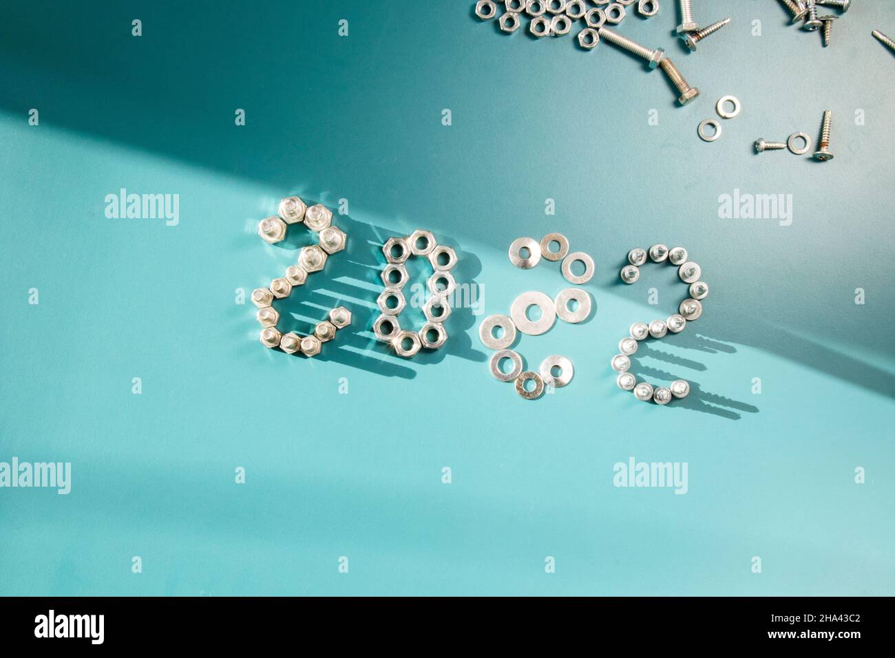 2022 New year numbers with bolts and nuts, building materials numbers ...